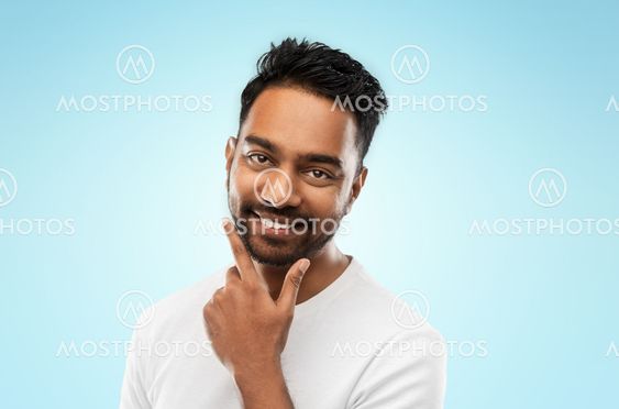 "smiling indian man touching..." av Syda Productions - Mostphotos