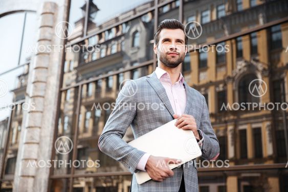 "Young serious man in jacket..." af Dean Drobot - Mostphotos