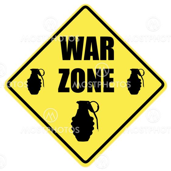 "War zone warning sign" av Dave Willman - Mostphotos