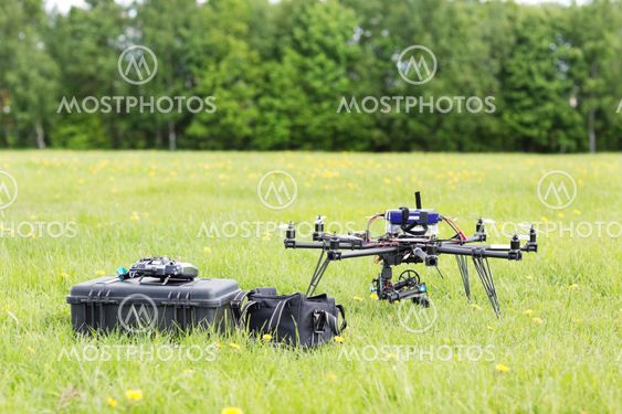 "UAV Helicopter With Toolbox..." by Doug Olson - Mostphotos