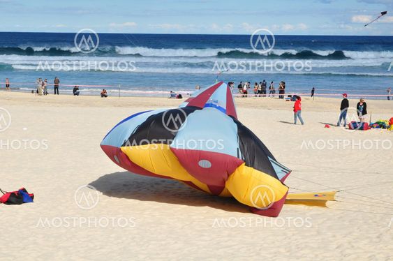 "The Colorful UFO kite on th..." by Bundit Minramun - Mostphotos