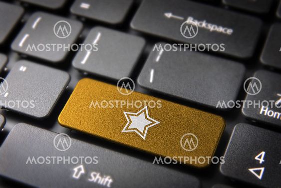 "Gold Star keyboard key, Ent..." by cienpies - Mostphotos