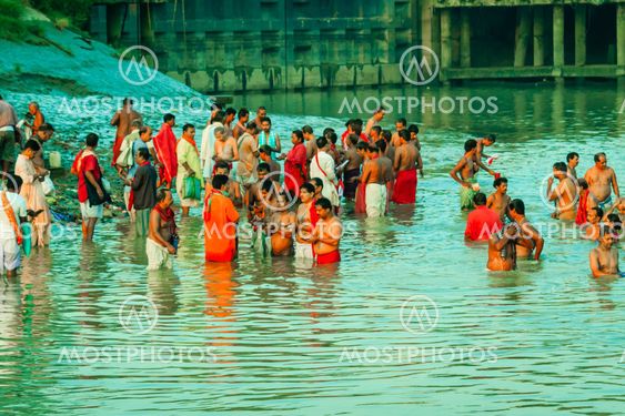"Devotees taking holy bath o..." by SB Stock - Mostphotos