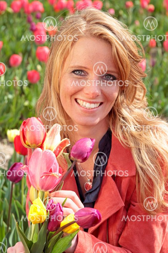 "dutch woman between de flow..." by devy - Mostphotos