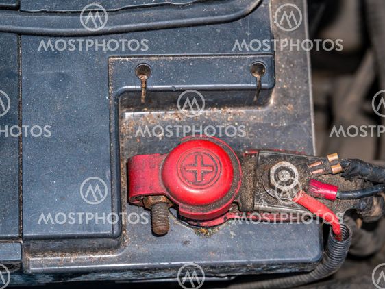 "Red positive terminal with..." av Yurii Malashchenko - Mostphotos